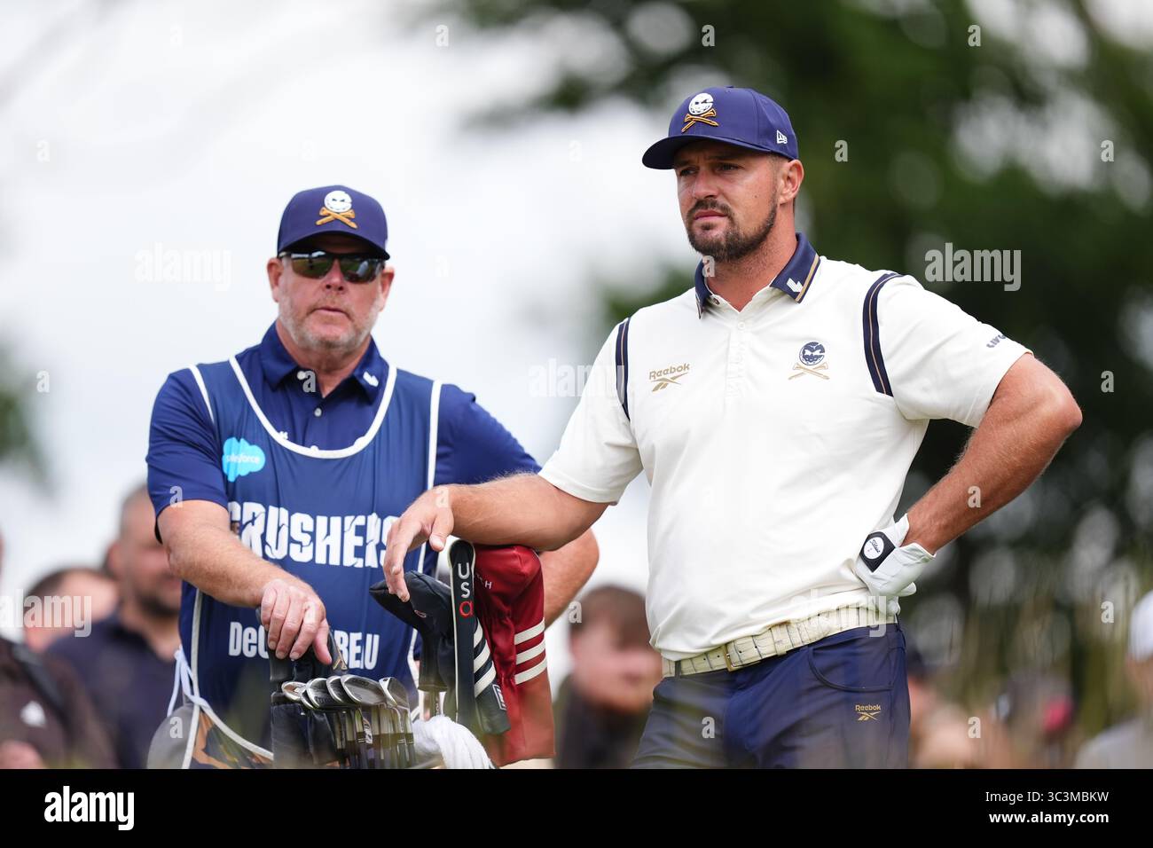 Bryson DeChambeau of Crushers GC (right) with his caddy at JCB Golf and ...