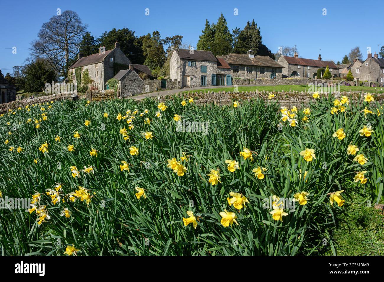 The pretty Peak District village of Tissington in spring, Derbyshire ...