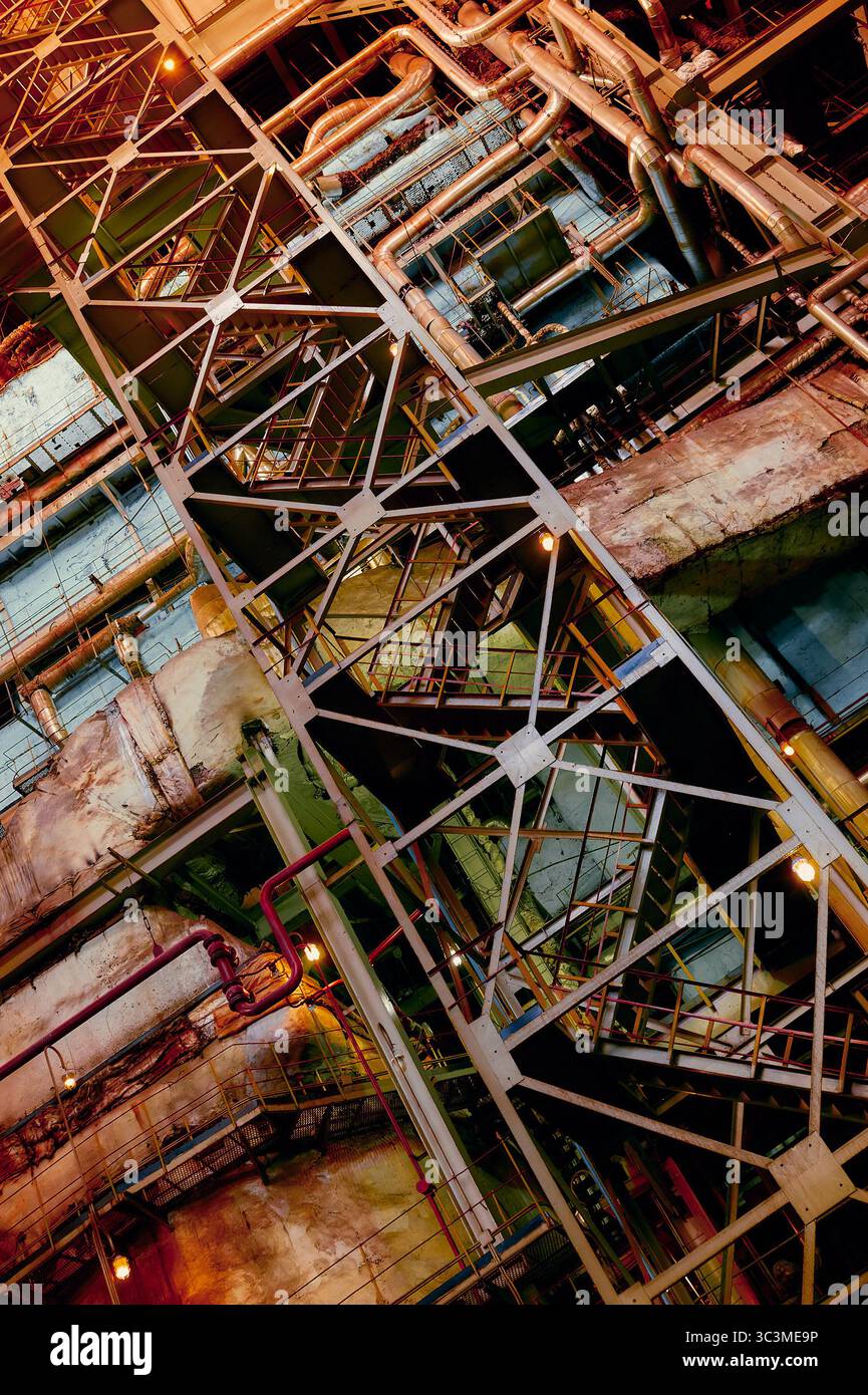 Industrial architecture showcasing complex pipe systems and structural ...