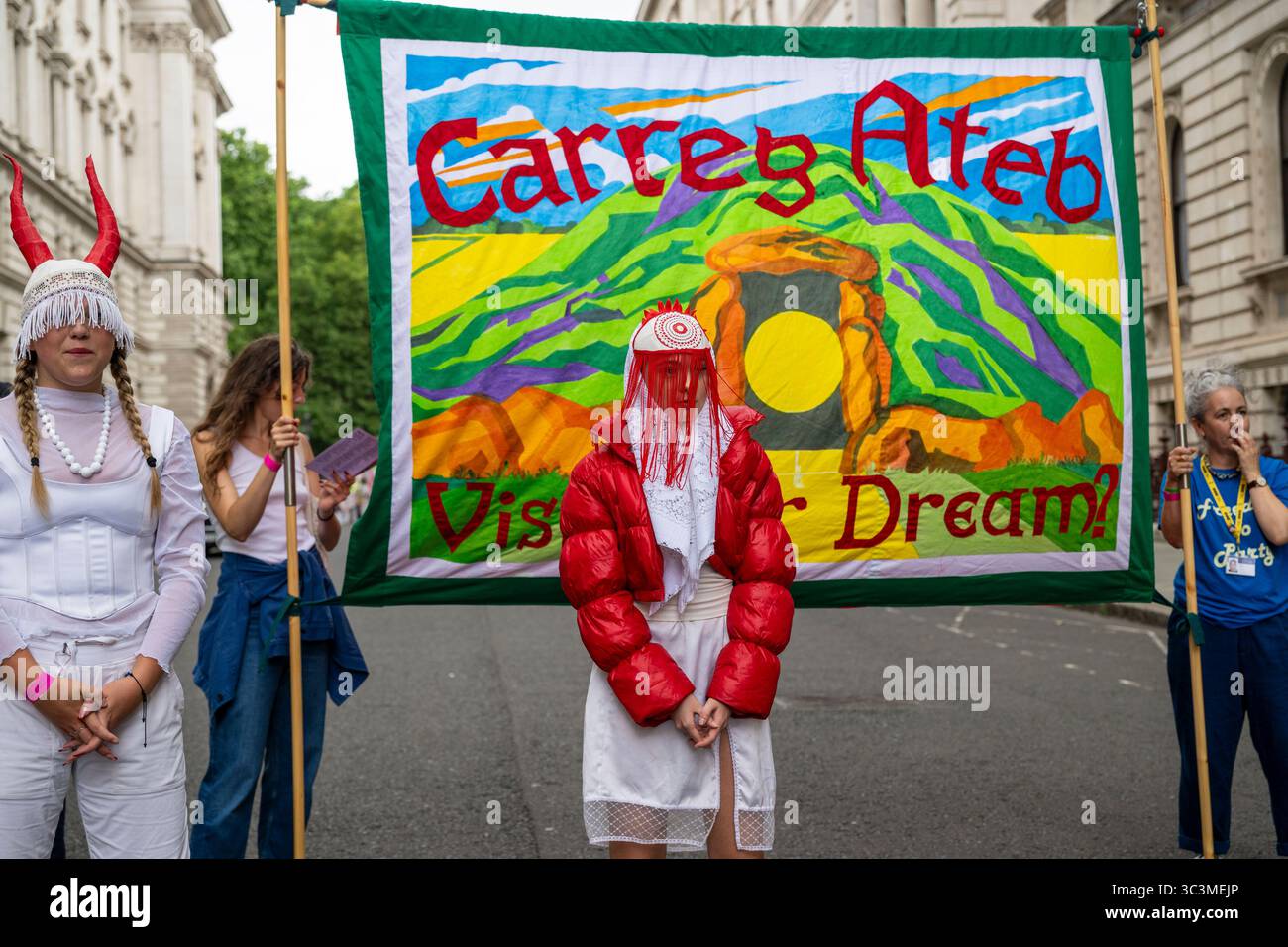 London, UK. 26 July 2025. Costumed characters prepare to take part in ...