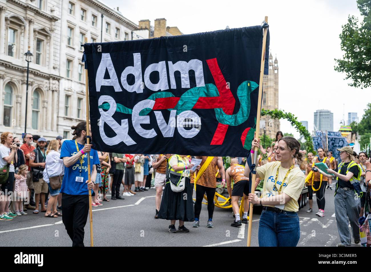 London, UK. 26 July 2025. Adam and Eve characters take part in the ...