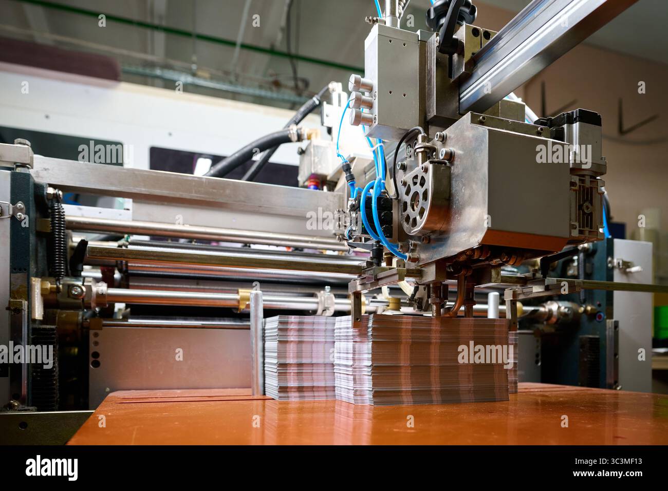 Innovative paper sheet feeding mechanism enhancing glue application ...