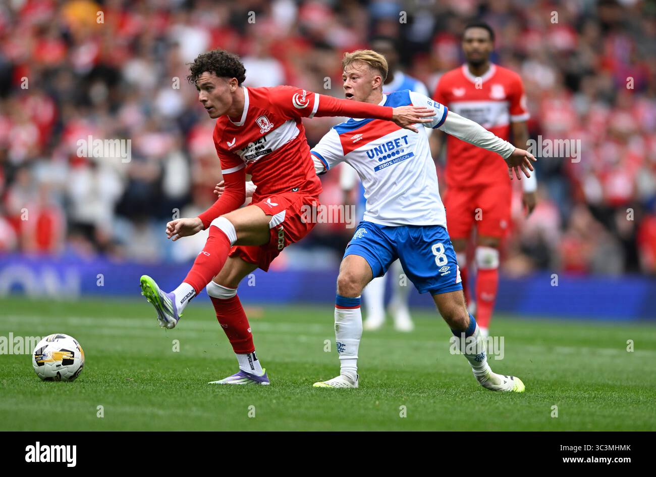 Middlesbrough's Law McCabe (left) and Rangers Connor Barron (right ...