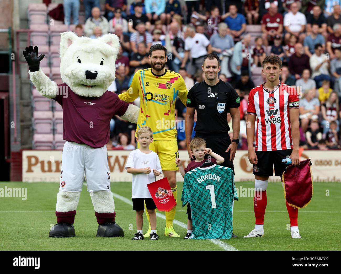 Heart of Midlothian goalkeeper Craig Gordon (second left) poses for a ...