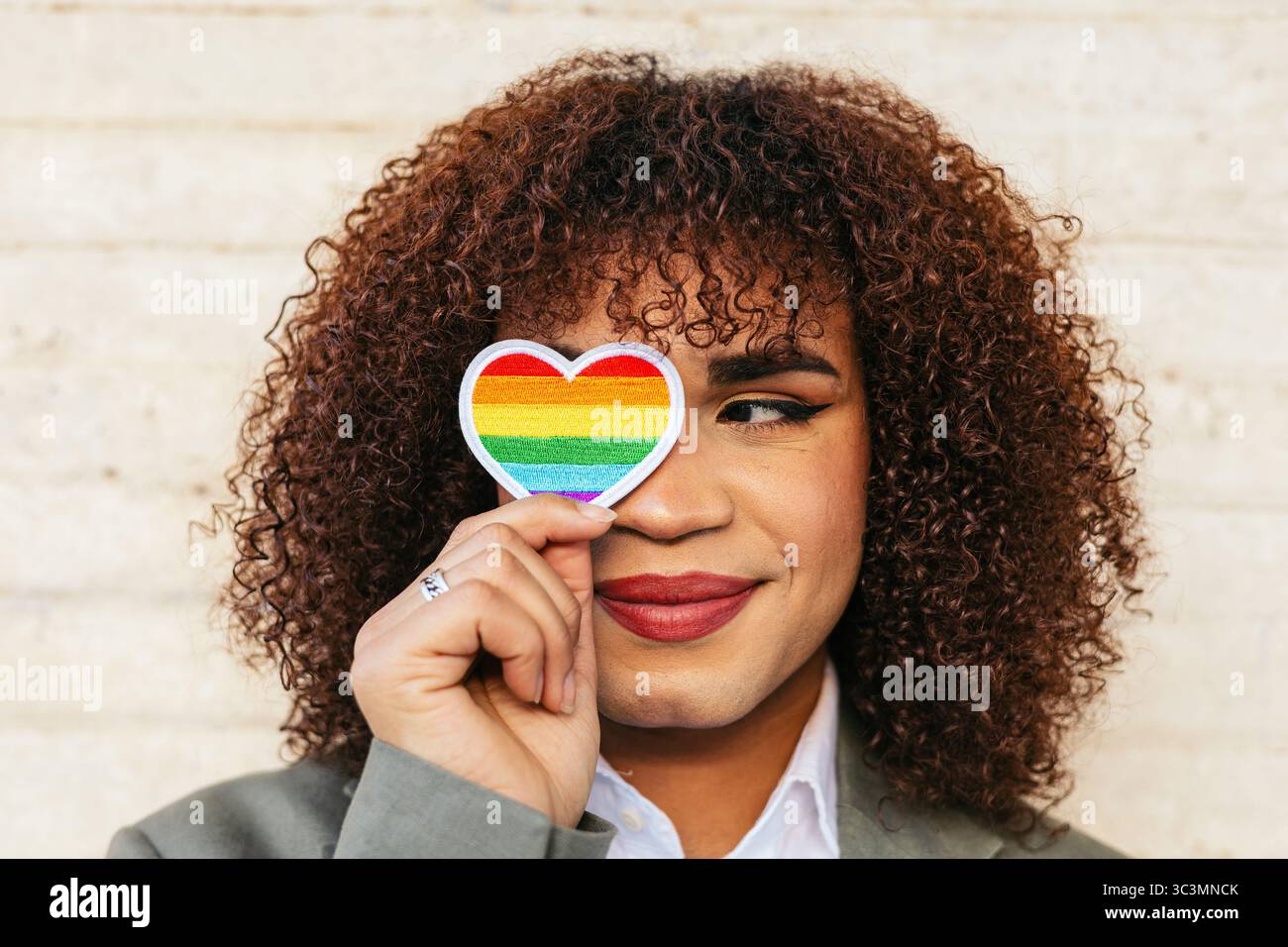 Transgender hispanic woman holds hi-res stock photography and images ...