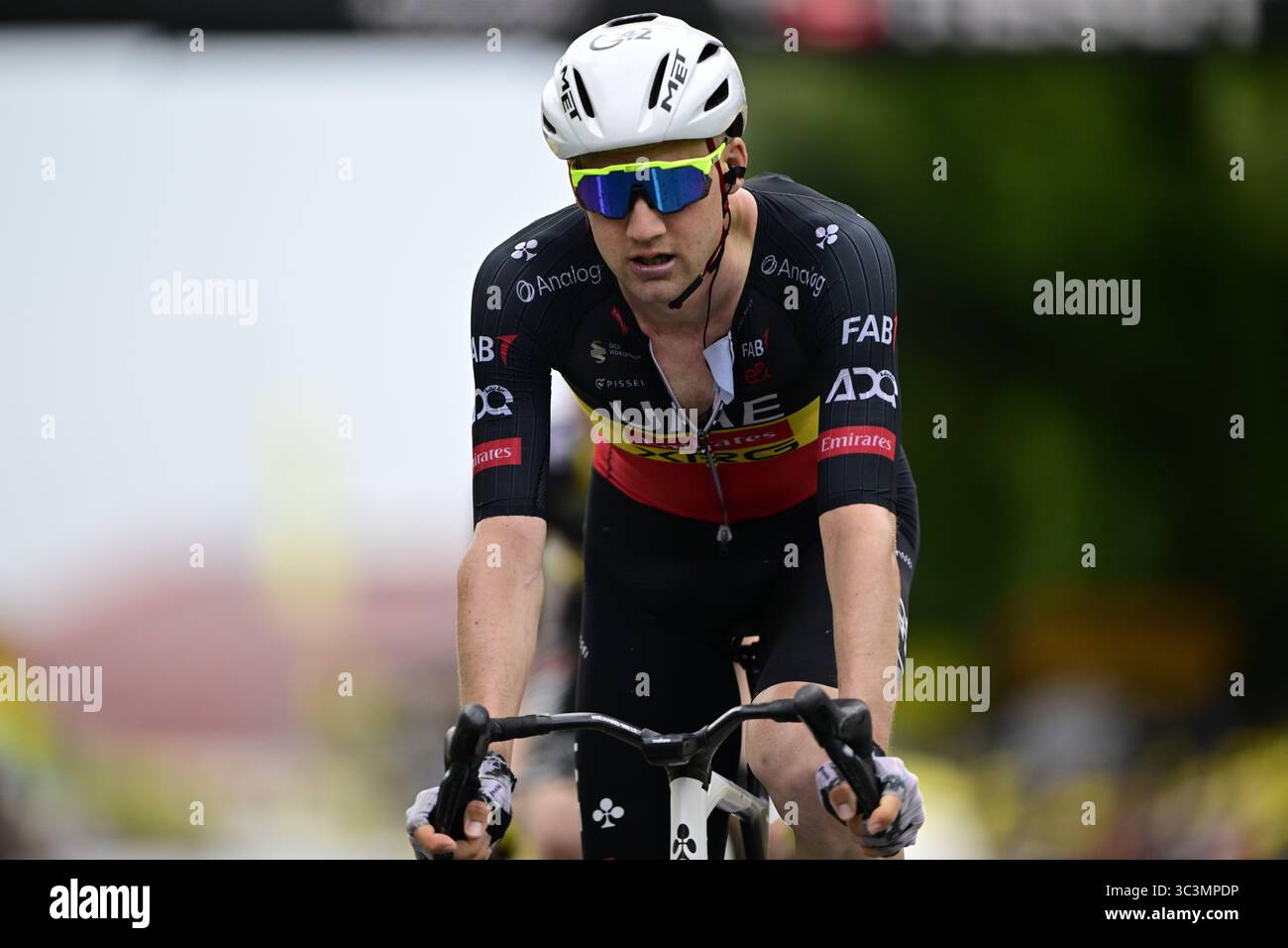 Belgian Tim Wellens of UAE Team Emirates crosses the finish line of ...