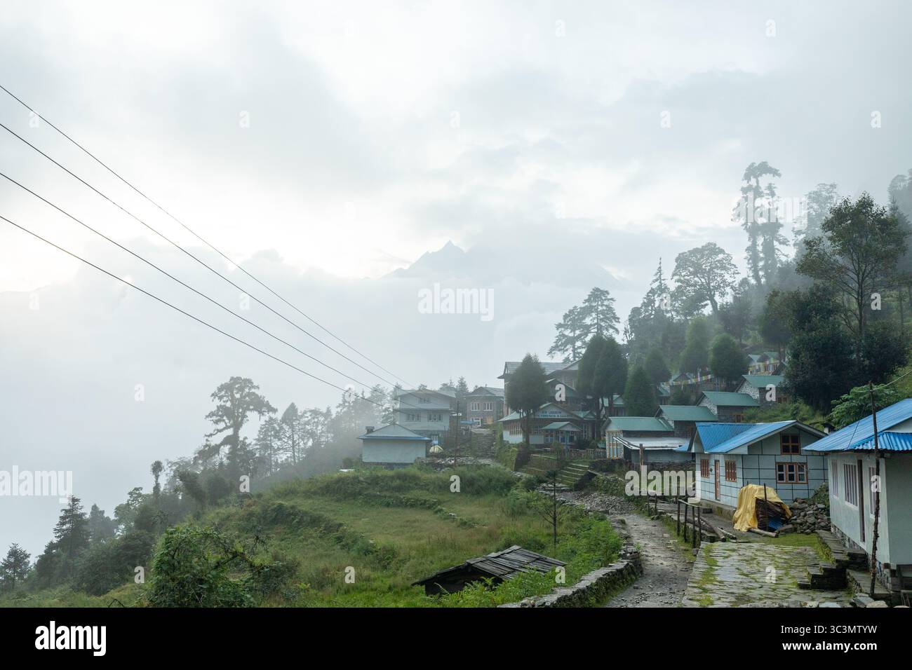 Misty morning view of namche bazaar, a picturesque village in Nepal ...