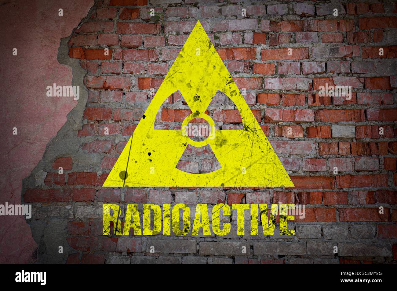 Yellow radioactive sign on old brick wall. Radiological pollution Stock ...