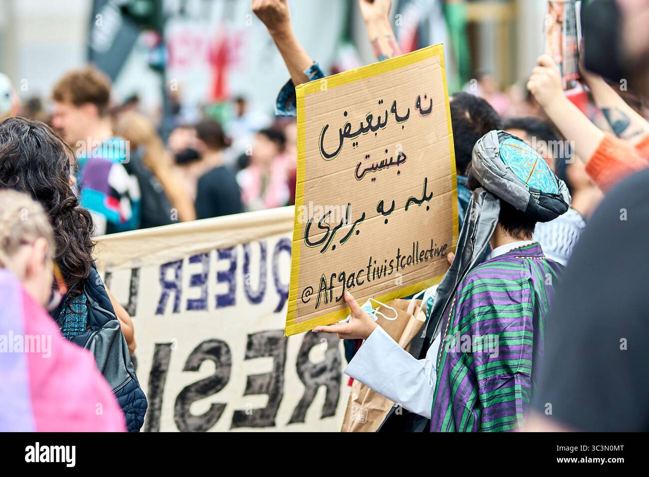 26 July 2025, Berlin: A participant of the Internationalist Queer Pride ...