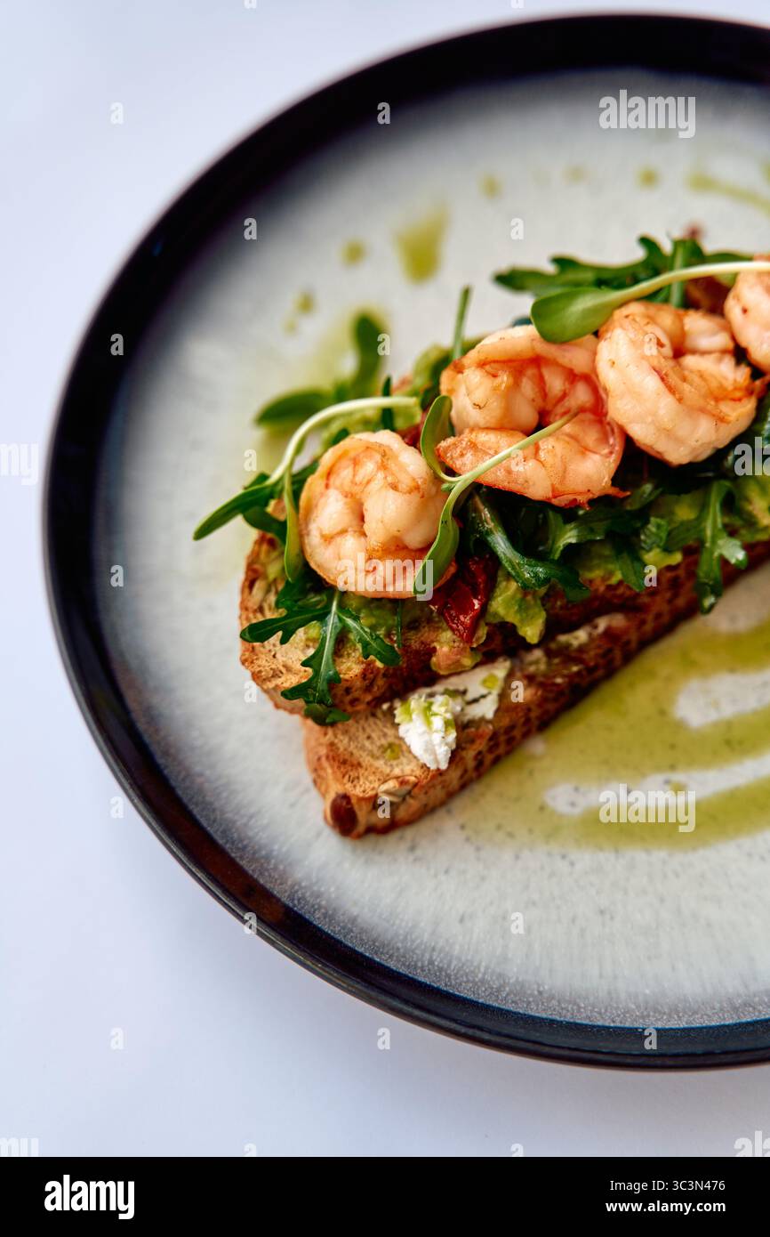 Savor delicious open faced sandwich hi-res stock photography and images ...