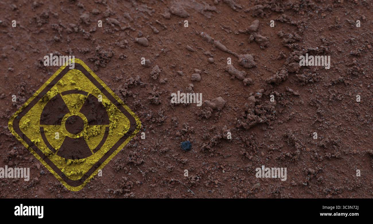 Yellow radioactive sign on brown ground, top view. Radiological ...