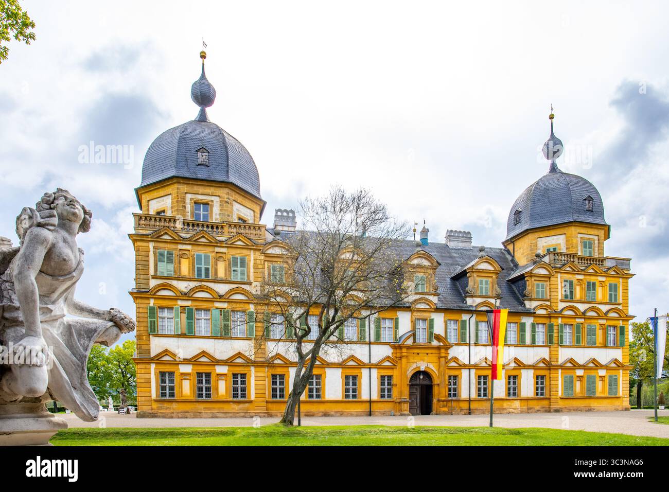 The historic Seehof Palace Park with the palace at sunset. Landscape ...
