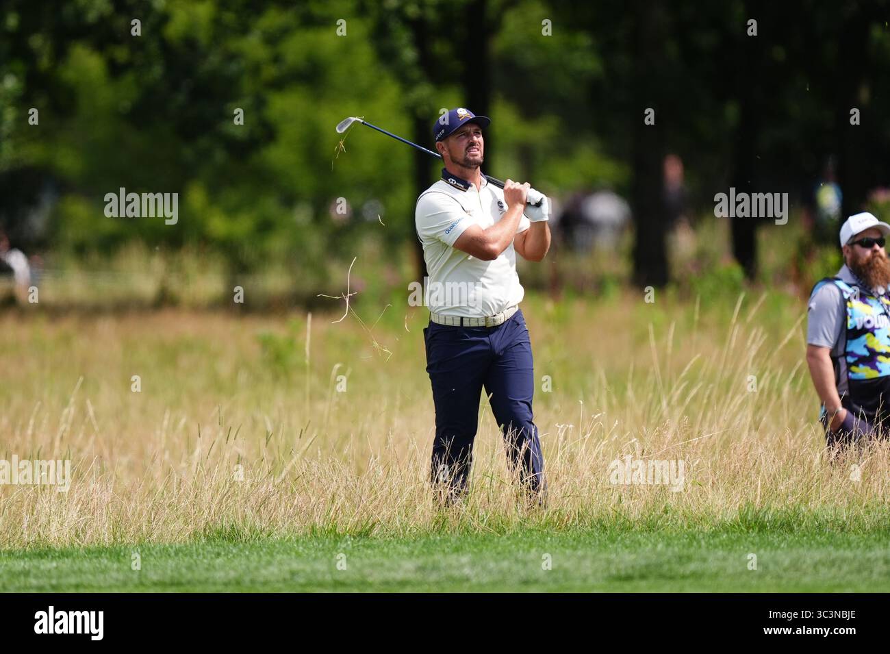 Bryson DeChambeau of Crushers GC plays out the rough at JCB Golf and ...