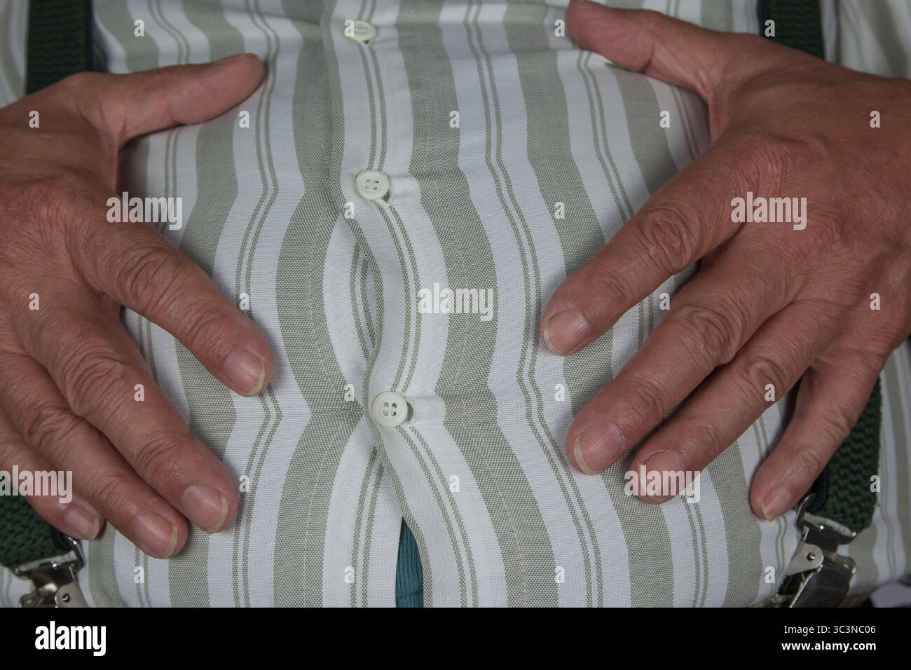 Overeating overload hi-res stock photography and images - Alamy