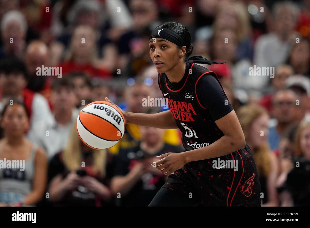 Indiana Fever's Sydney Colson dribbles during the first half of a WNBA ...