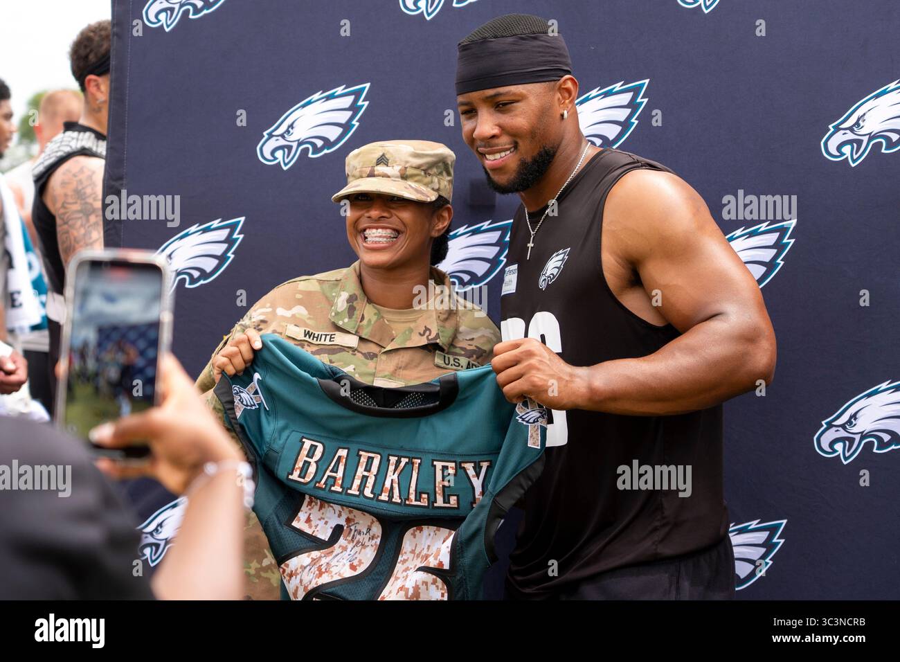Philadelphia Eagles' Saquan Barkley, right, poses for a photo as he ...
