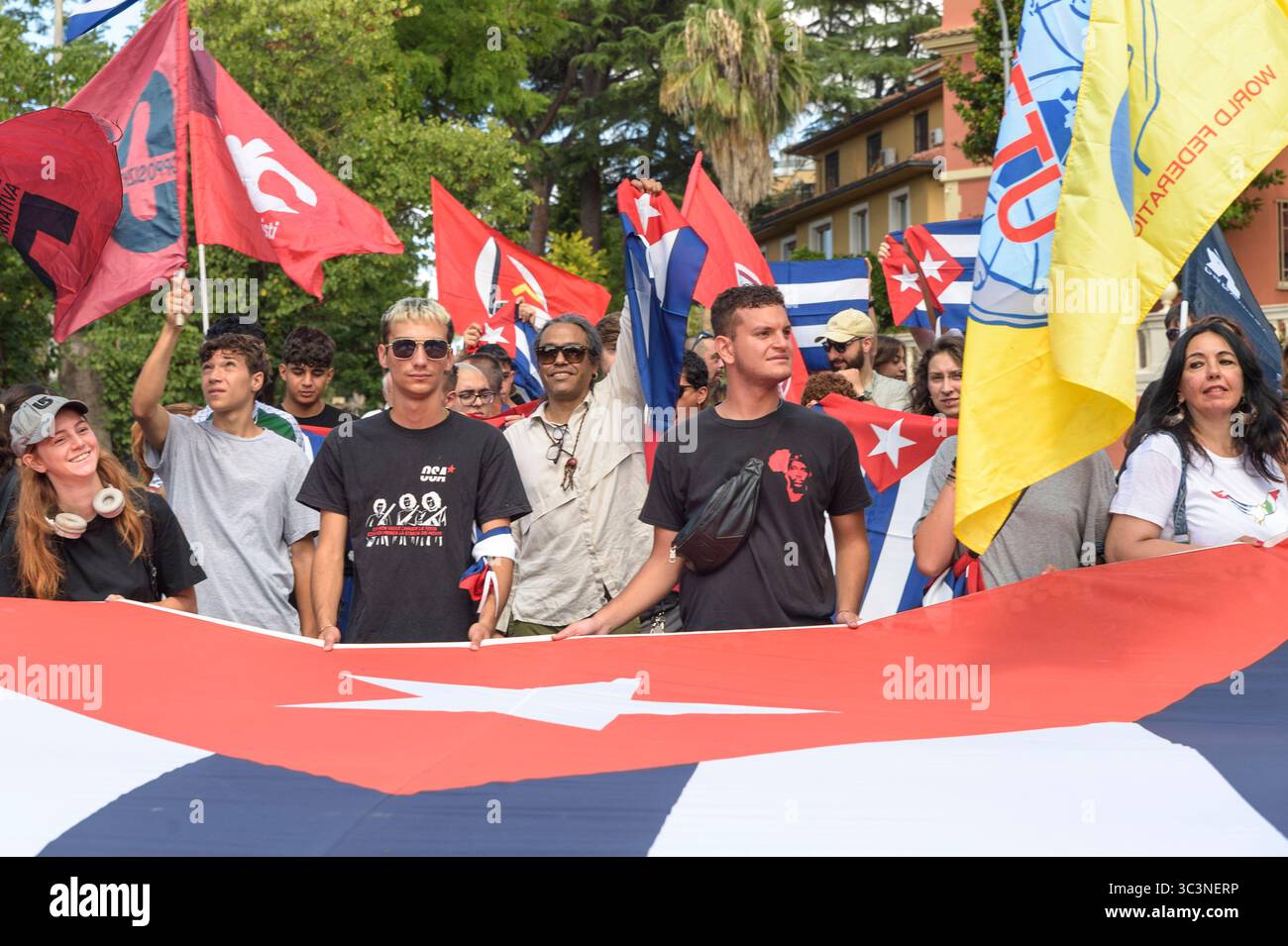 Rome, Italy. 26th July, 2025. Cubans and sympathizers display Cuban ...