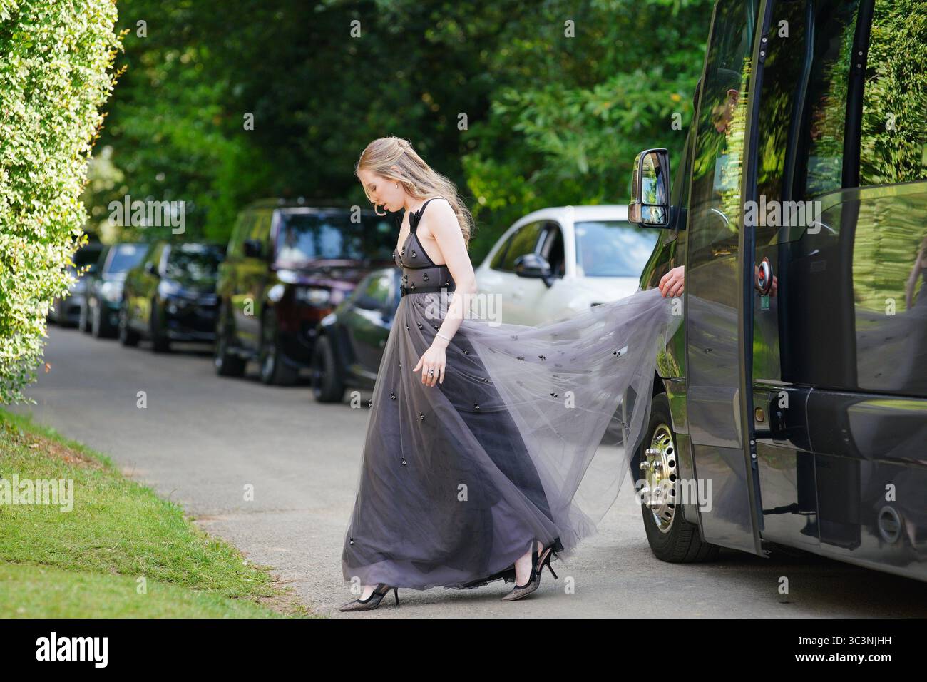 A guest arrives for the wedding of Eve Jobs, the daughter of the late ...