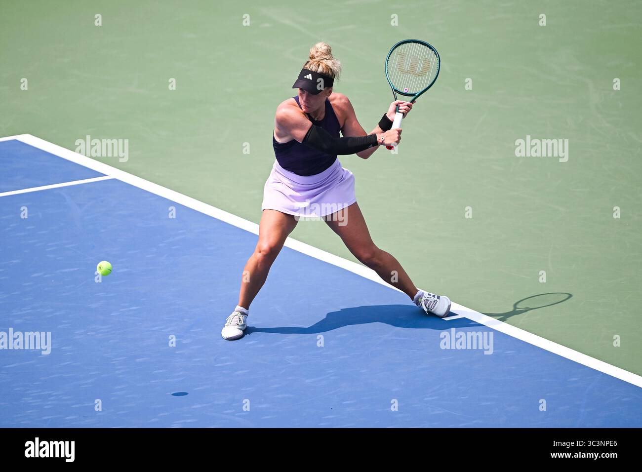 MONTREAL, QC - JULY 26: Leolia Jeanjean (FRA) returns the ball during a ...