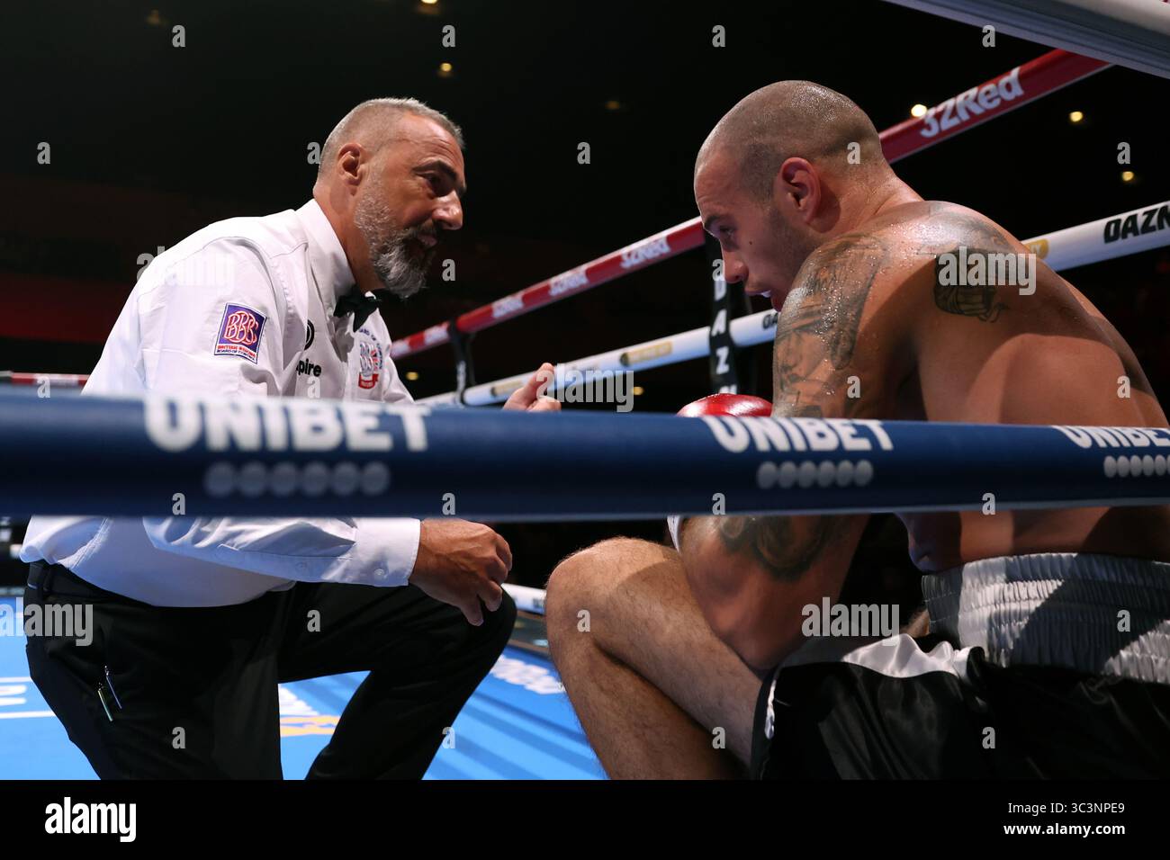 Zdenko Bule speaking to the referee during his their super middleweight ...