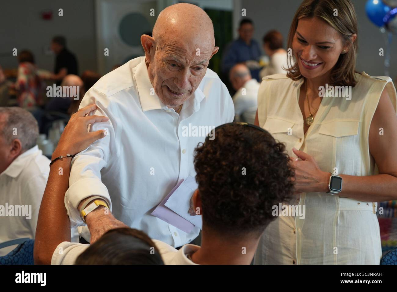 Harold Terens, a World War II veteran who fought in D-Day, greets ...
