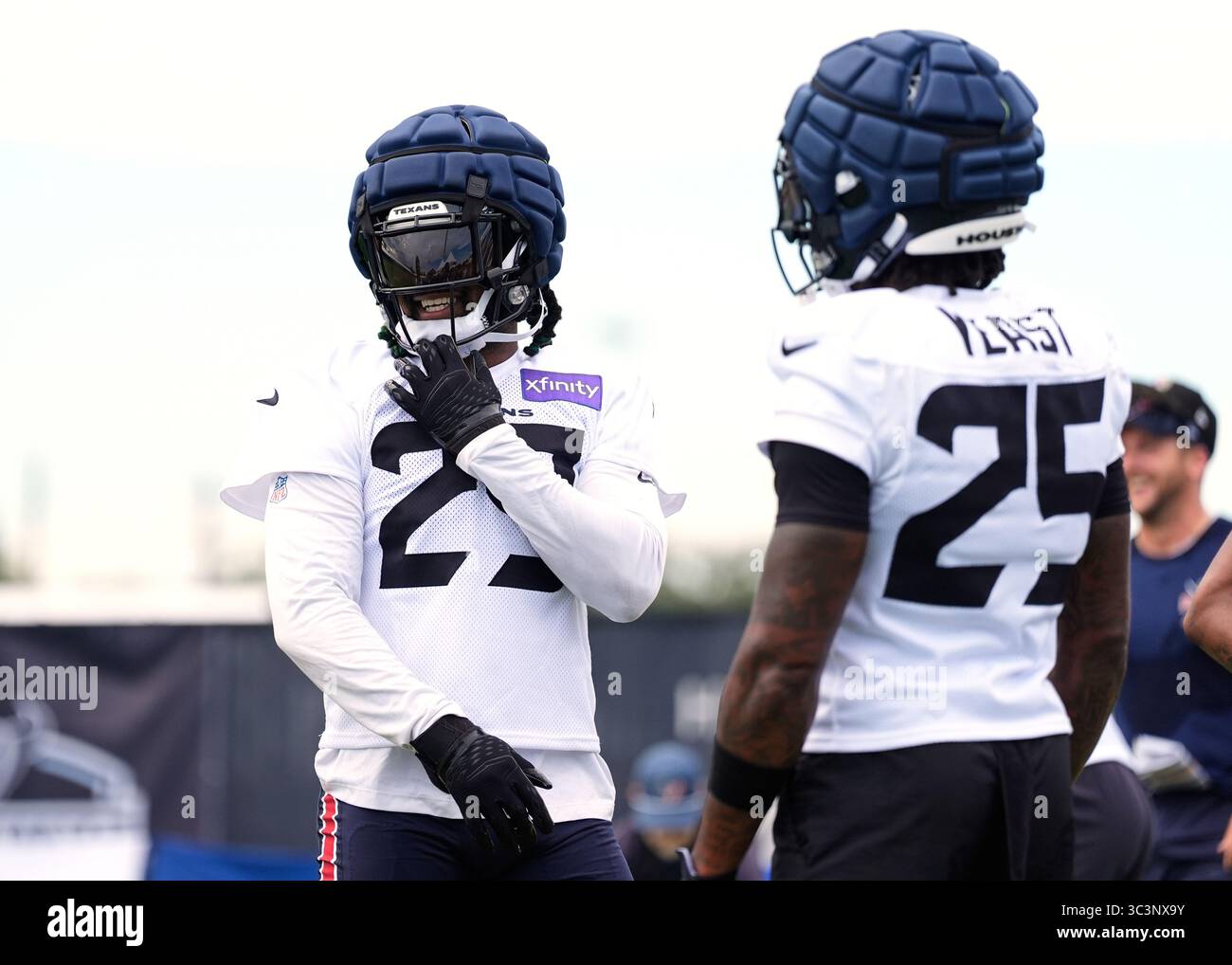 Houston Texans safety M.J. Stewart (29) talks with safety Russ Yeast ...