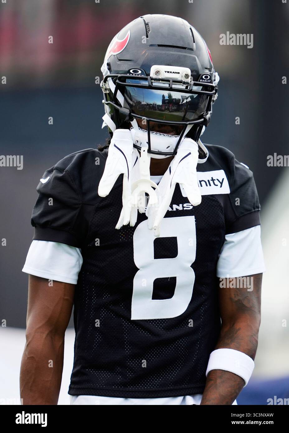 Houston Texans wide receiver John Metchie III (8) works out during Back ...