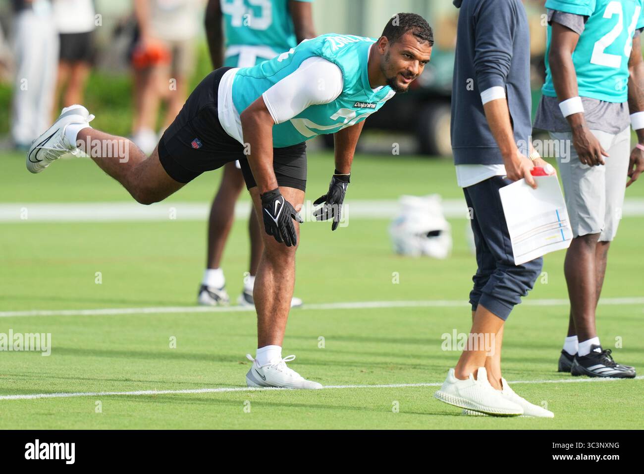 Miami Dolphins safety Minkah Fitzpatrick stretches during practice at ...