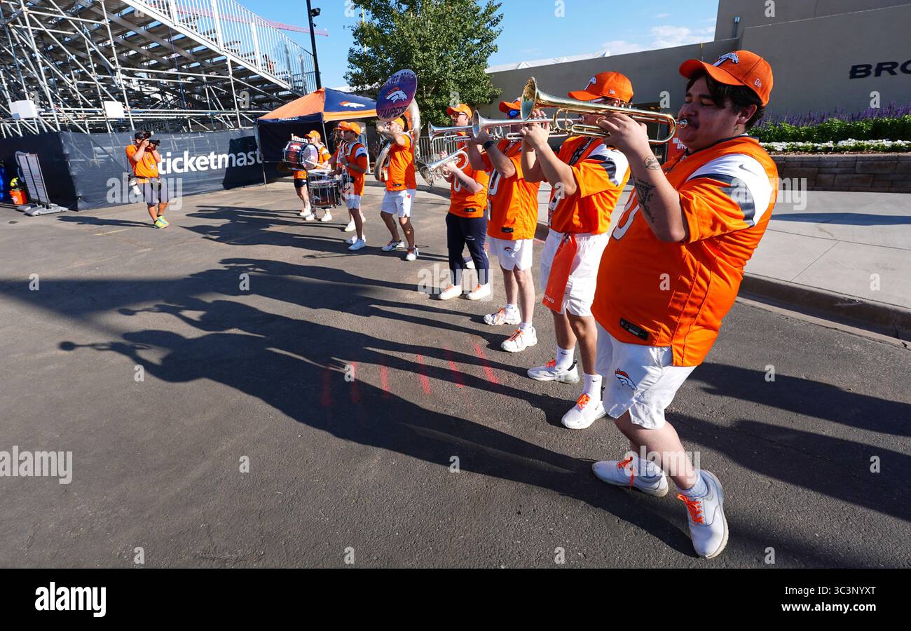Members of the Denver Broncos Stampede band perform for fans during Back Together Weekend at an ...