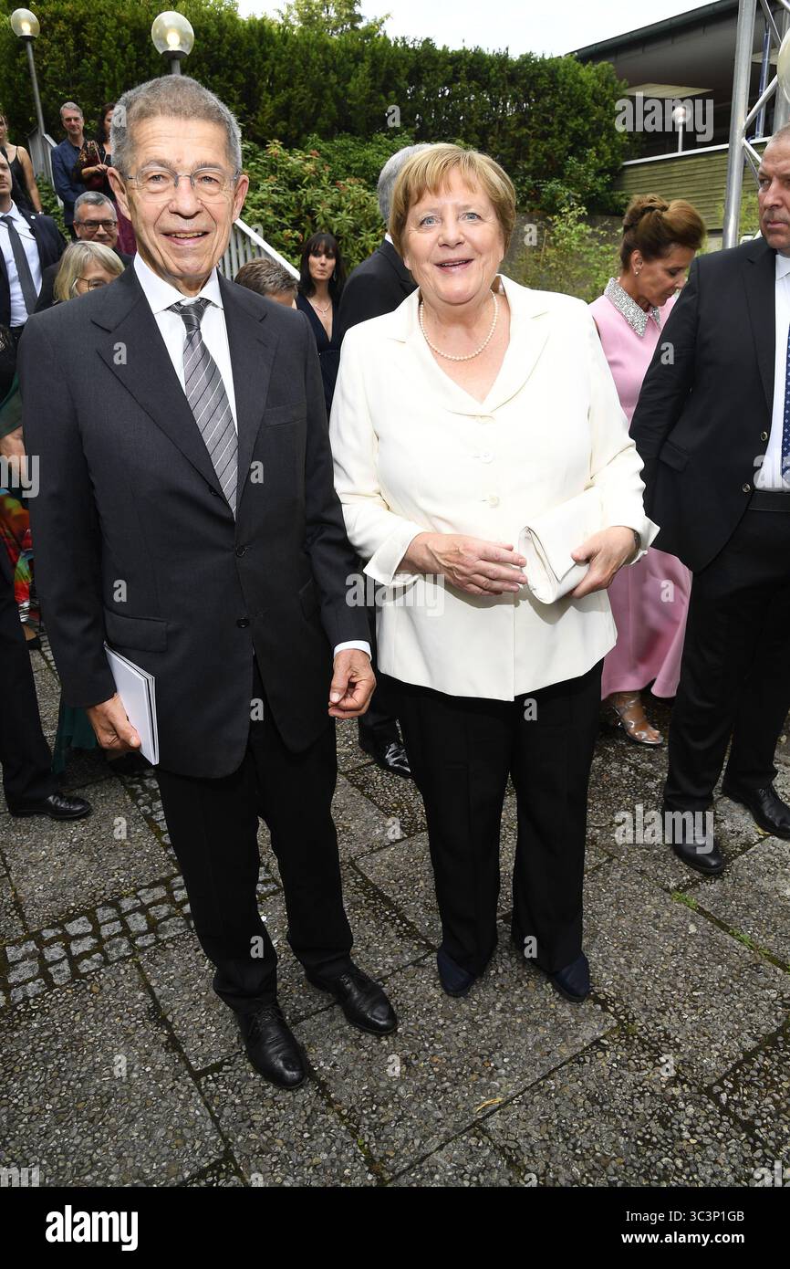 Angela Merkel und ihr Ehemann Joachim Sauer bei der Eroeffnung der ...