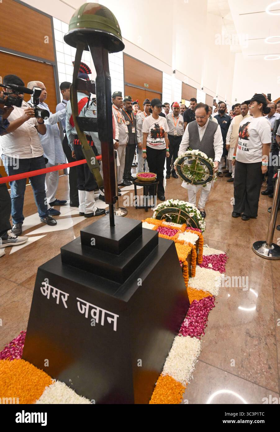 NEW DELHI, INDIA - JULY 26: BJP National President JP. Nadda salute the replica of Amar Jawan ...