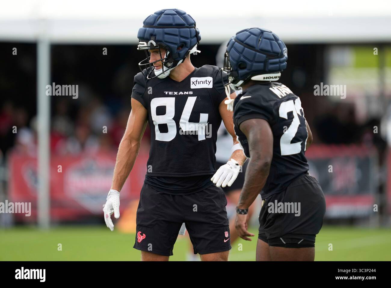 Houston Texans wide receiver Justin Watson (84) and running back Woody ...