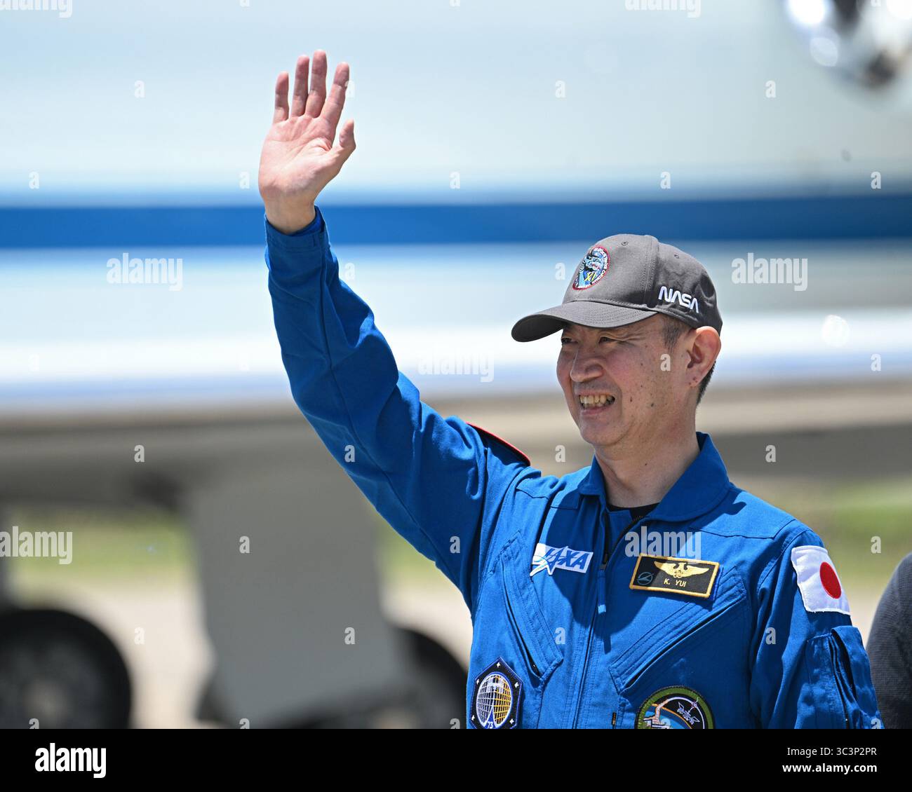 Crew 11 Mission Specialist and JAXA astronaut Kimiya Yui waves to the ...