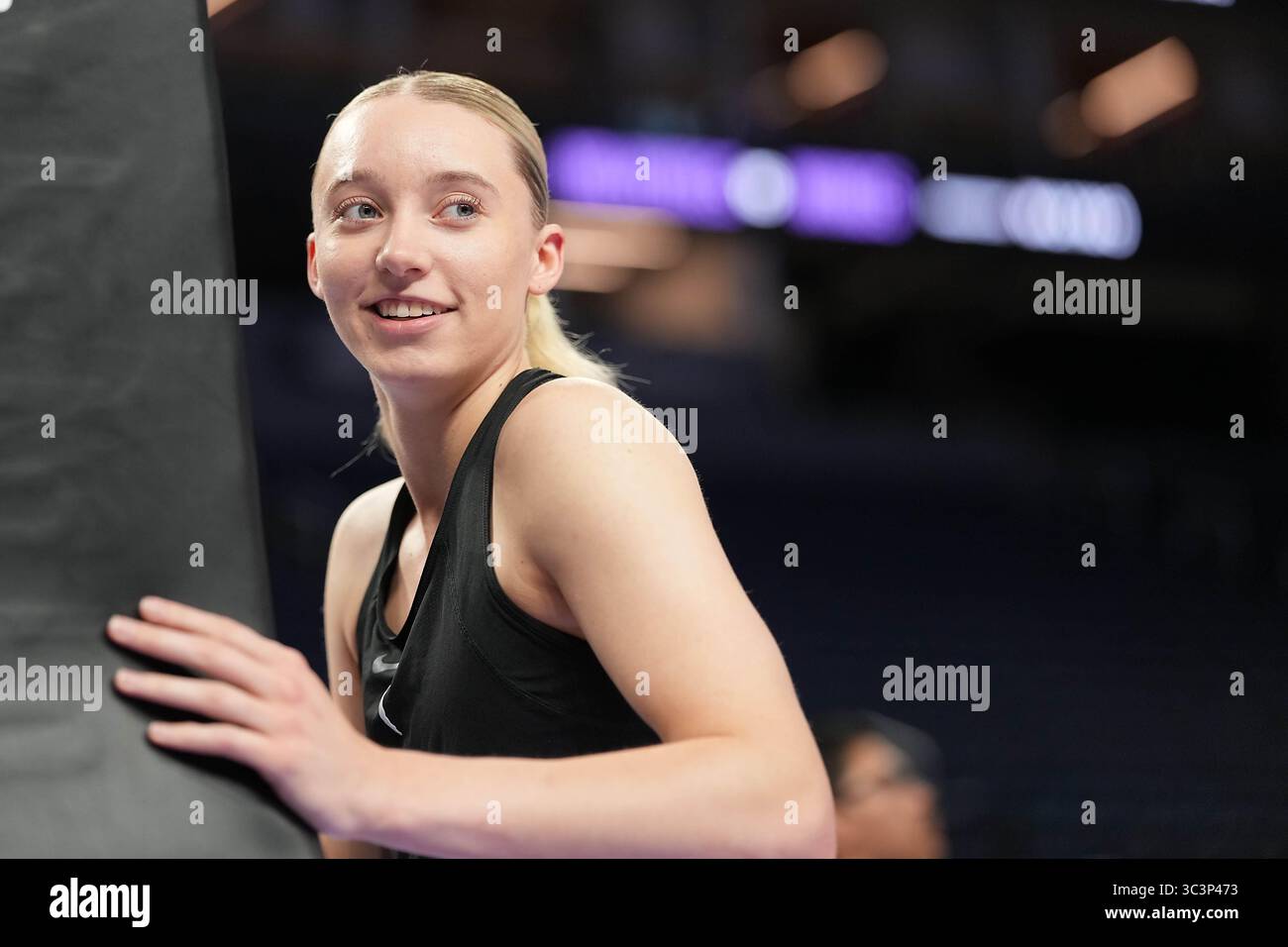 Dallas Wings guard Paige Bueckers (5) smiling at a fan before their ...