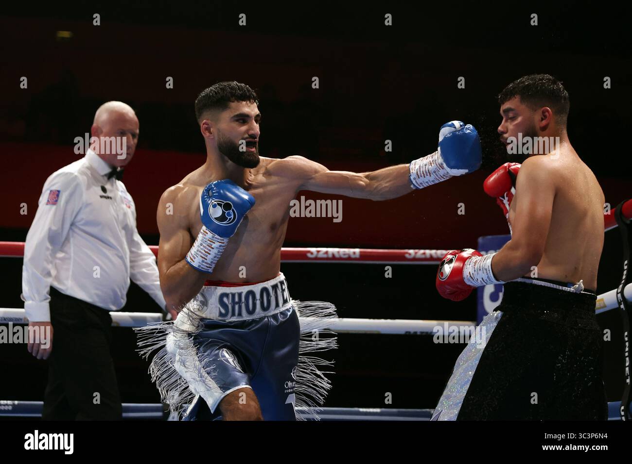 Hassan Ishaq (centre) and Brandon Gallardo Vargas during their super ...