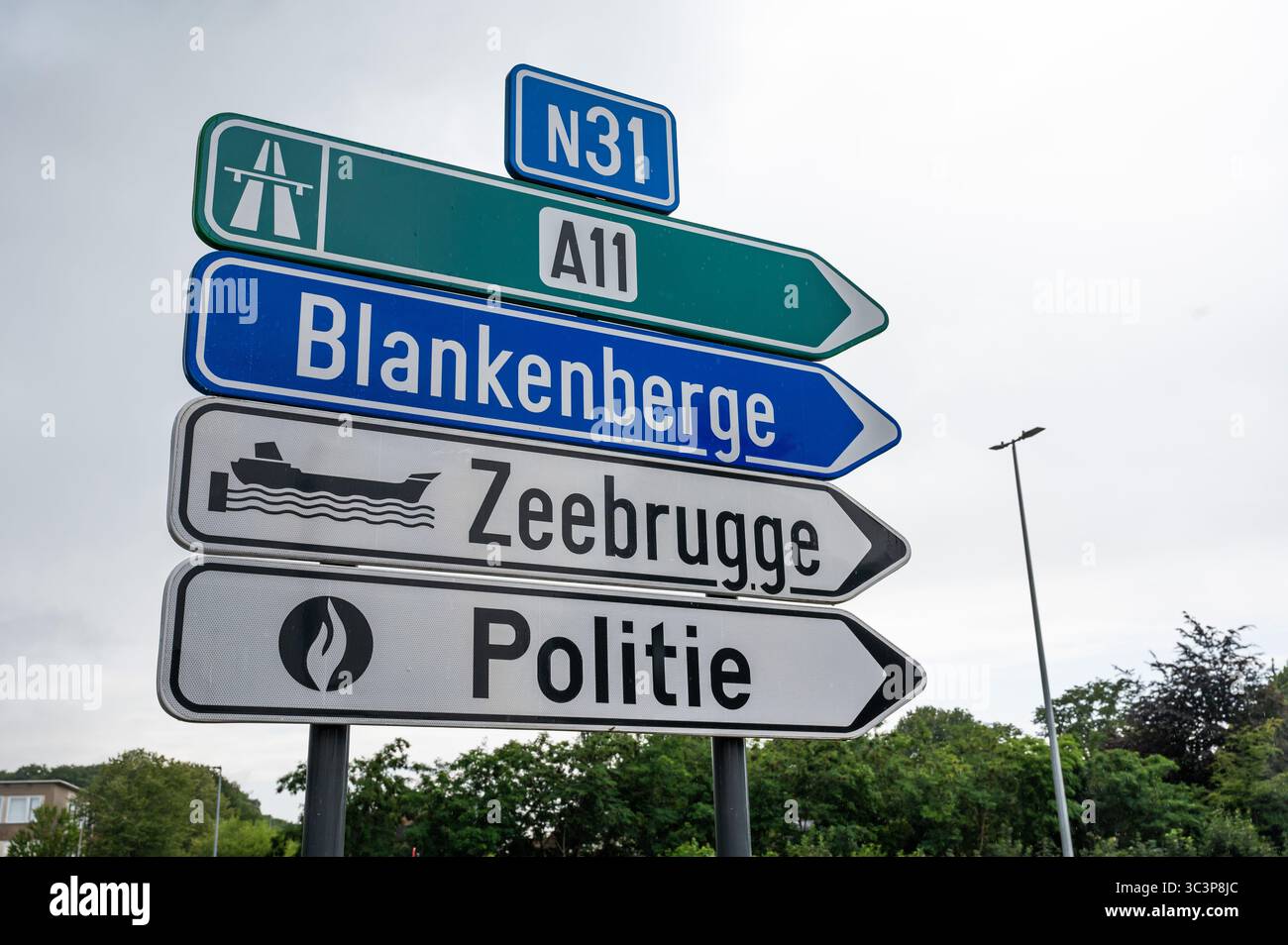 Direction signs to POI's and highway A 11 in Bruges, West Flanders ...