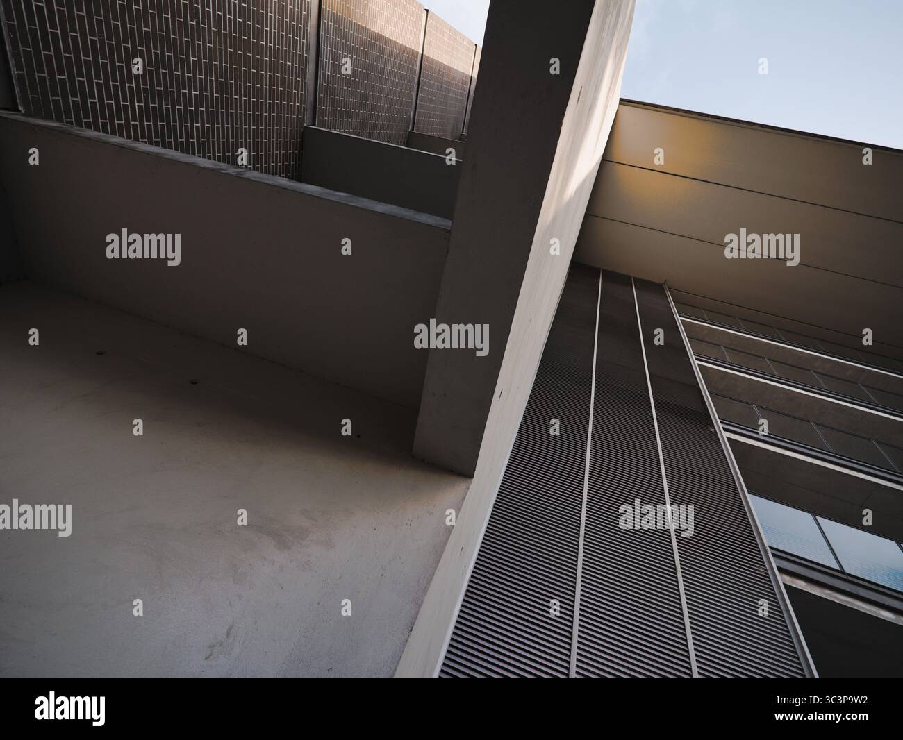 Concrete facade of a modern urban residential building. Features ...