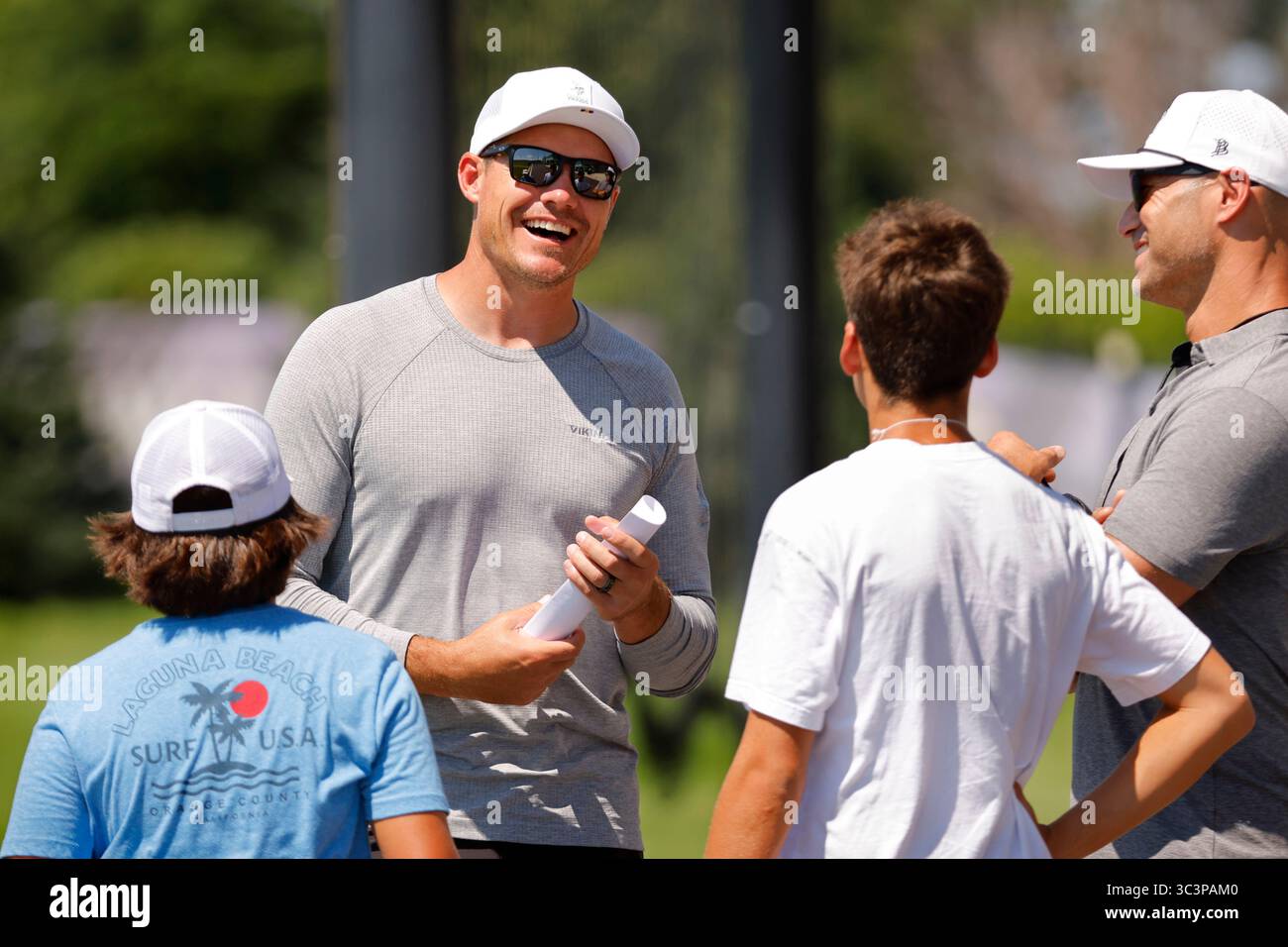 Minnesota Vikings head coach Kevin O'Connell, top left, talks with fans ...