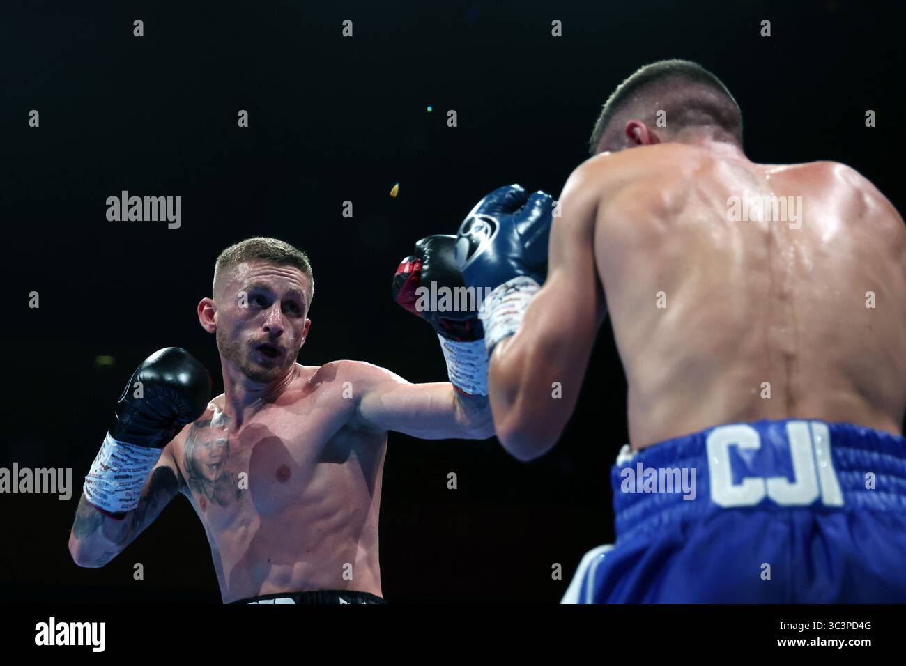 Ryan Garner (left) and Reece Bellotti in action during their European, Commonwealth, British and ...