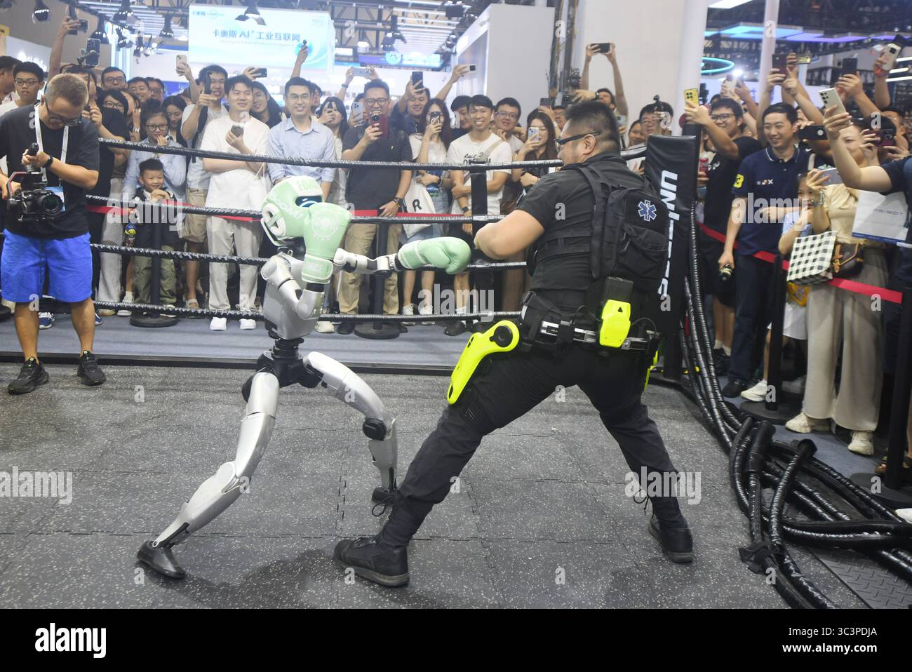SHANGHAI, CHINA - JULY 26, 2025 - A humanoid boxing robot of Unitree ...