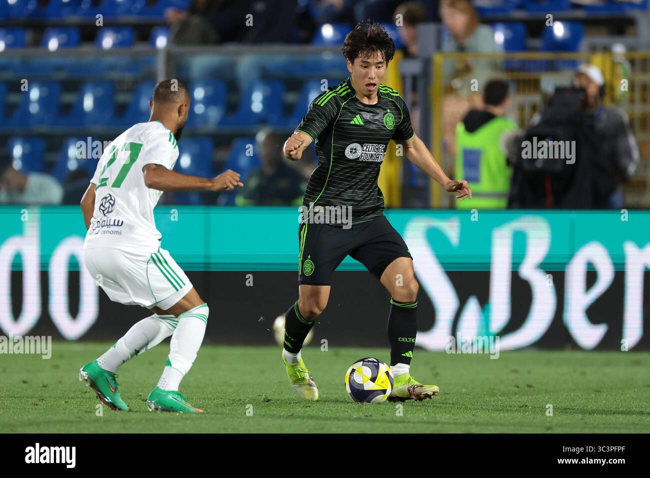 Como, Italy, 26th July 2025. Shin Yamada of Celtic takes on Ali ...
