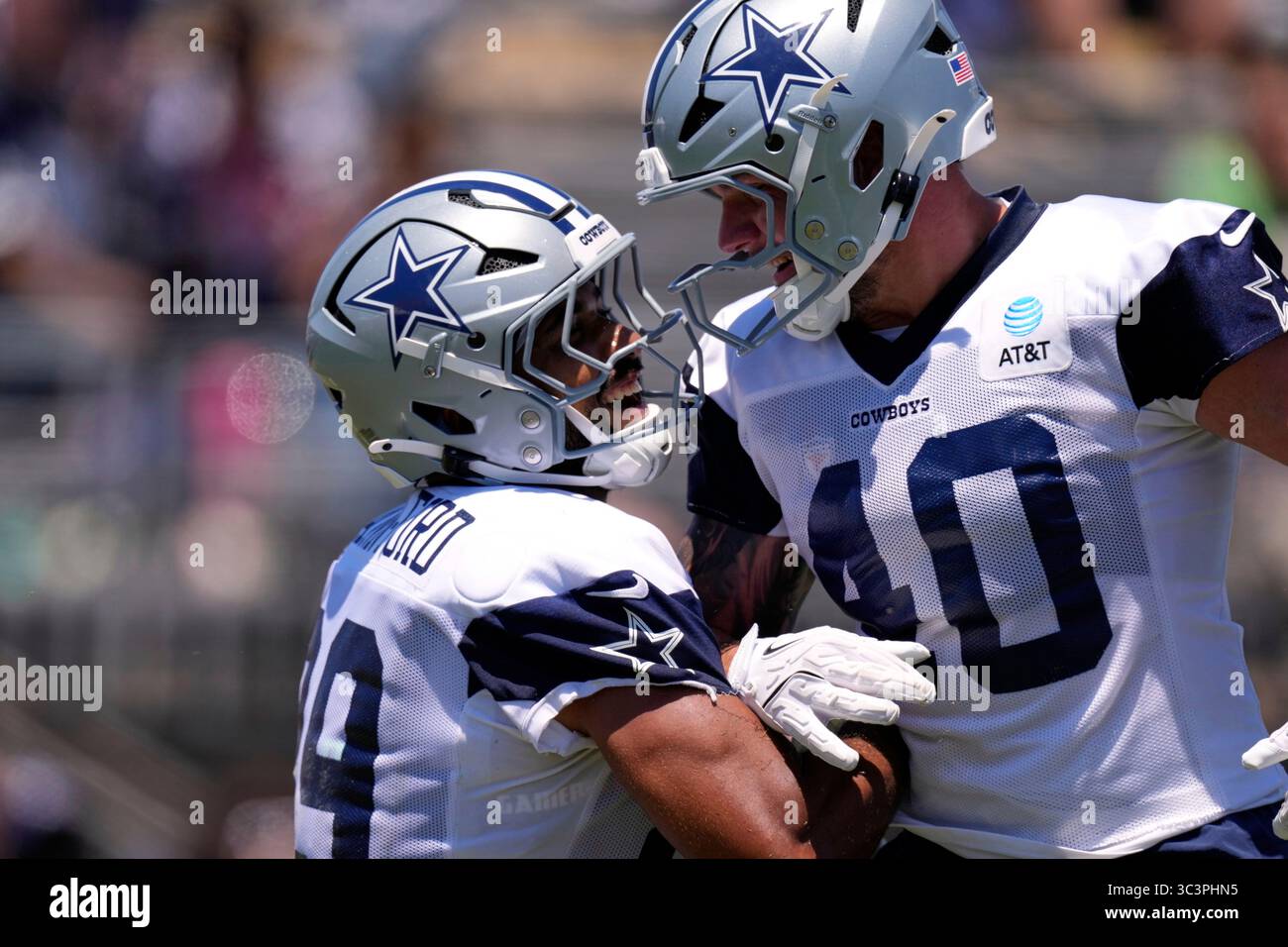 Dallas Cowboys tight end Brevyn Spann-Ford, left, and running back ...