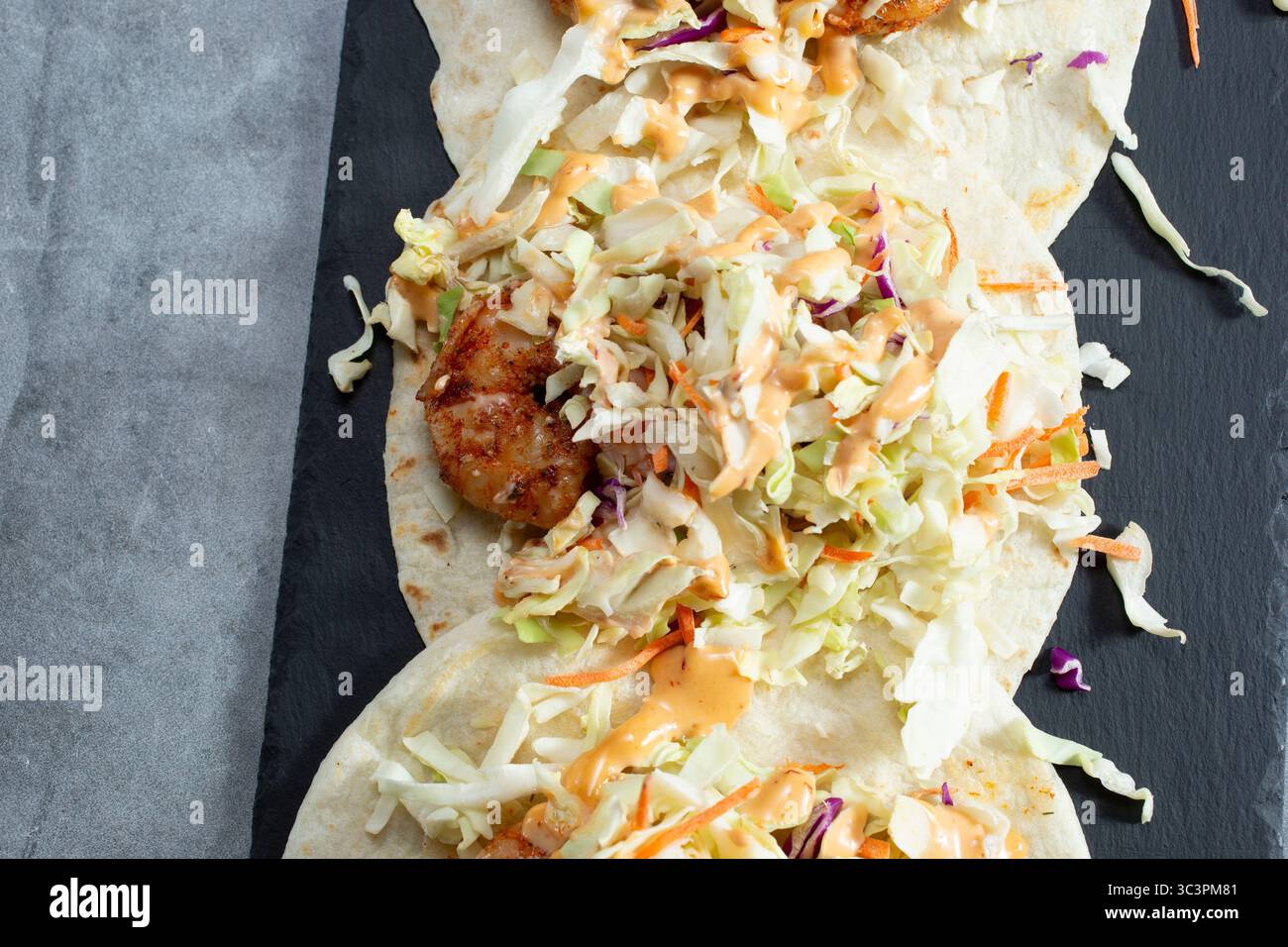 A top down view of shrimp tacos Stock Photo - Alamy