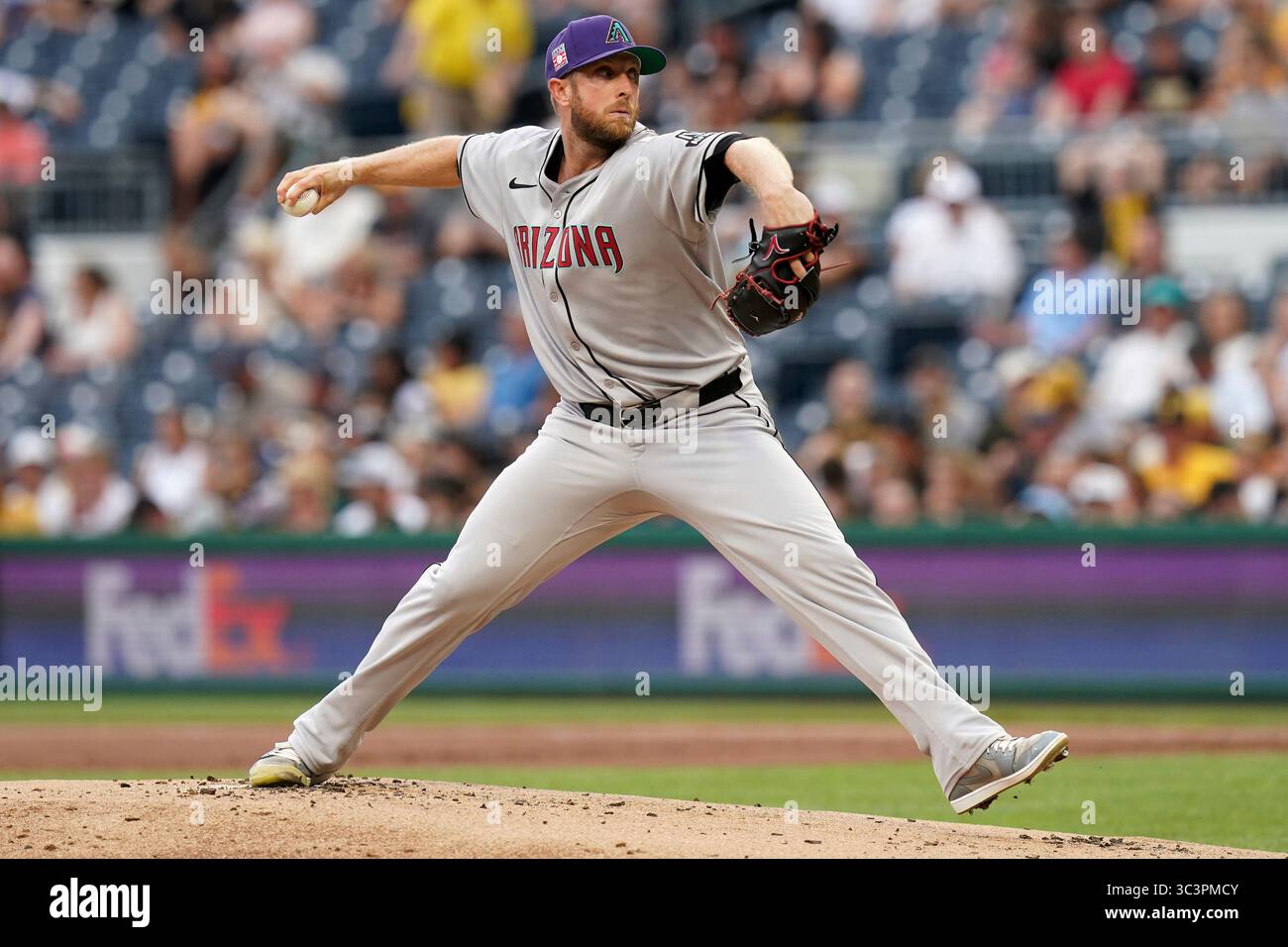 Arizona Diamondbacks pitcher Merrill Kelly delivers during the first ...