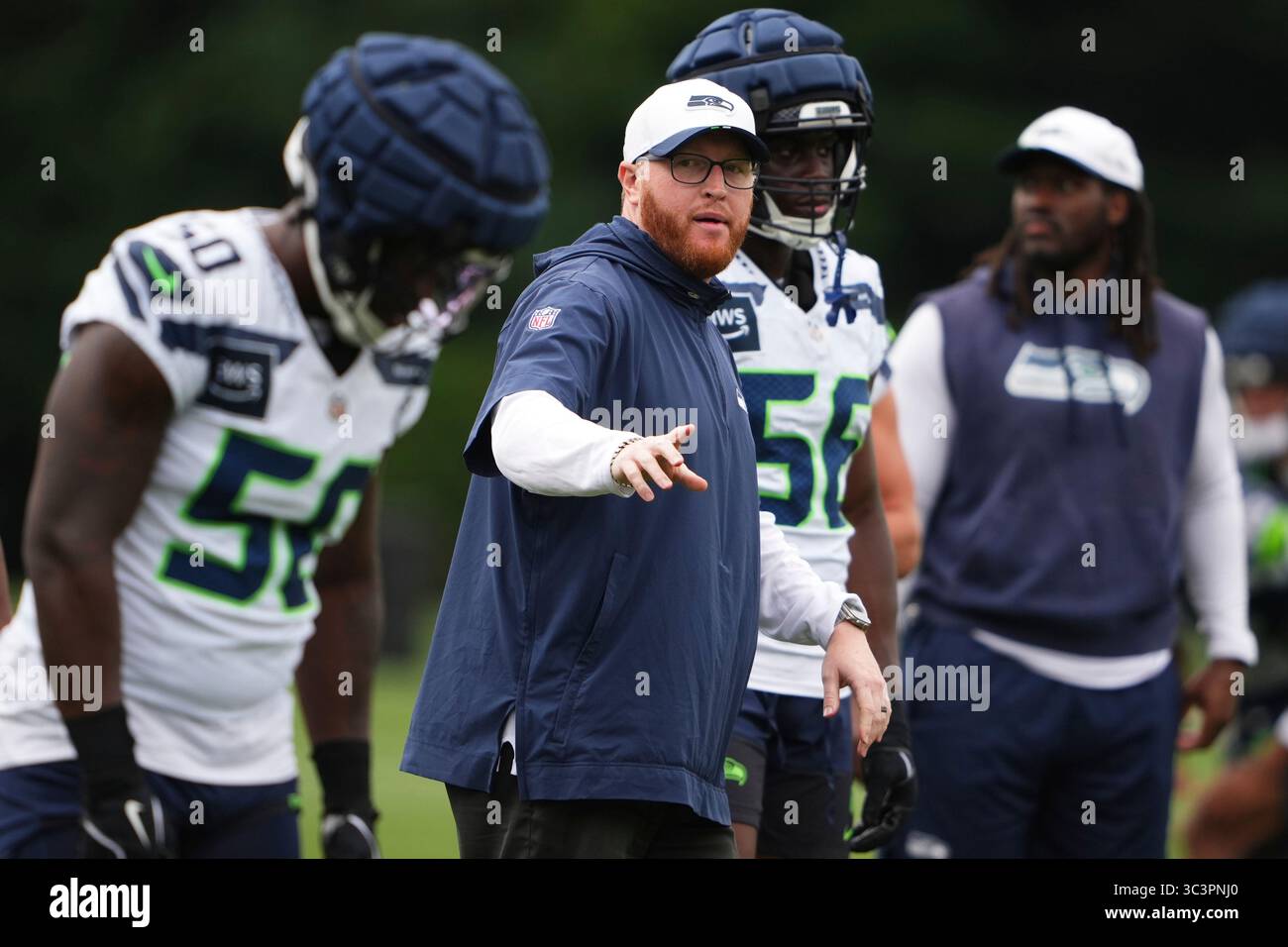 Seattle Seahawks special teams coordinator Jay Harbaugh gives ...