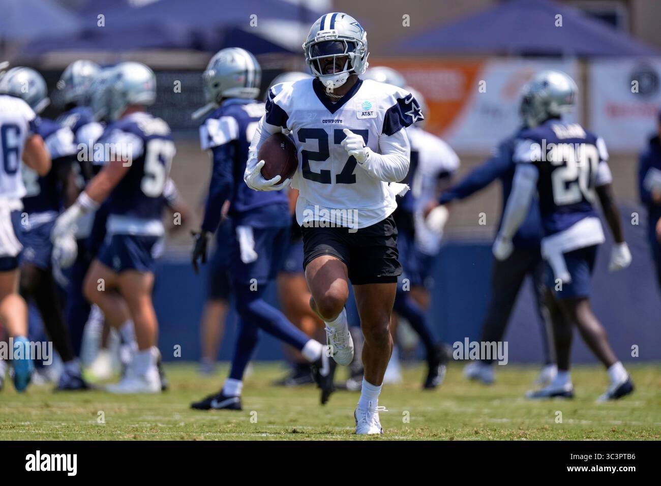 Dallas Cowboys running back Miles Sanders runs the ball during training ...