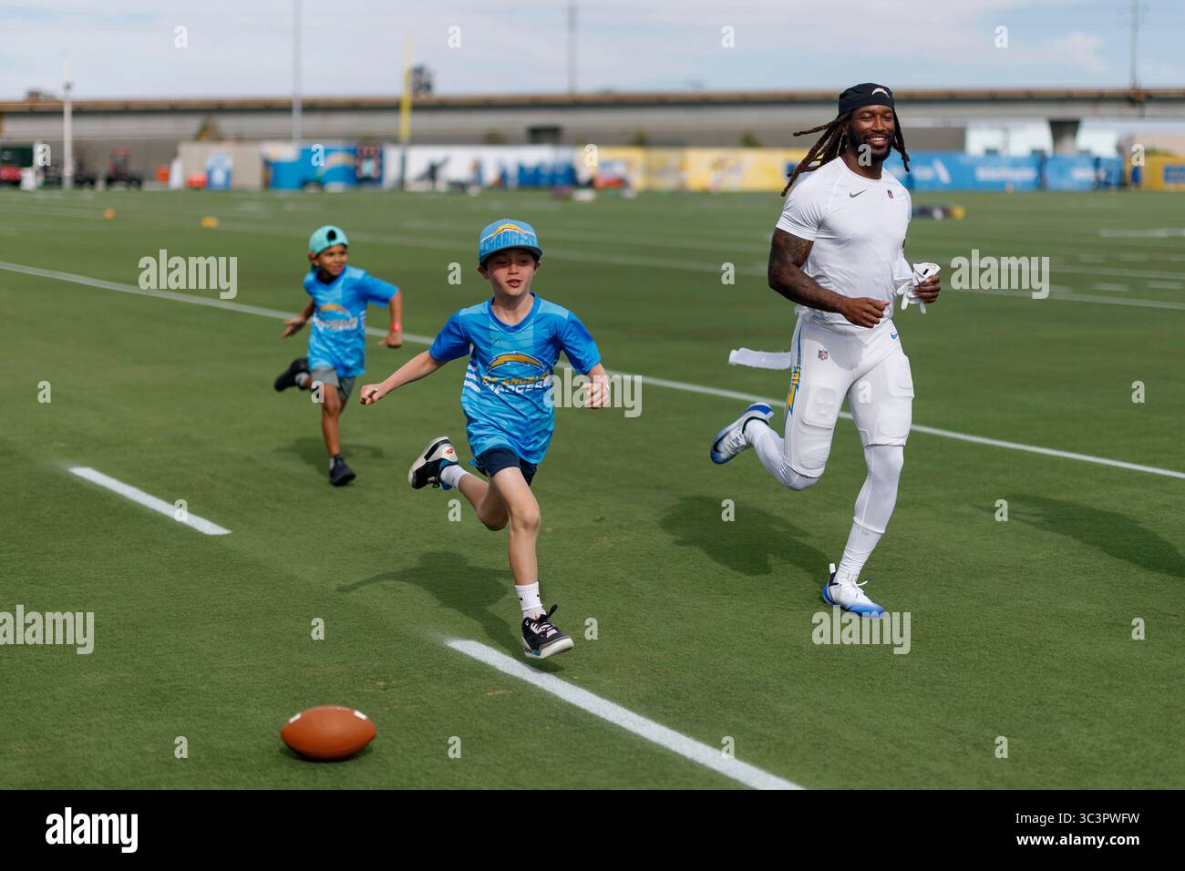 Los Angeles Chargers cornerback Ja'Sir Taylor, right, runs with with ...