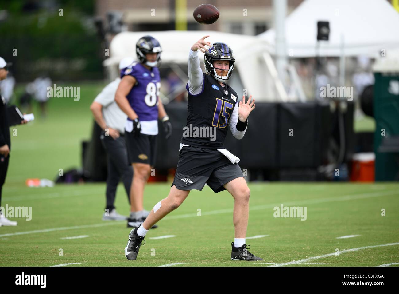 Baltimore Ravens quarterback Cooper Rush (15) works out during practice ...
