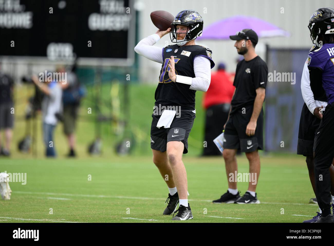 Baltimore Ravens quarterback Cooper Rush (15) works out during practice ...