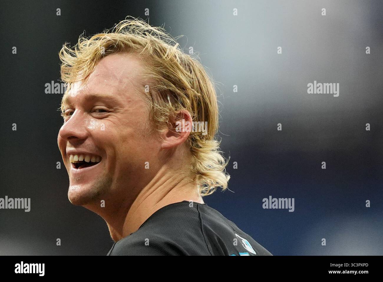 Miami Marlins' Kyle Stowers smiles during the seventh inning of a ...